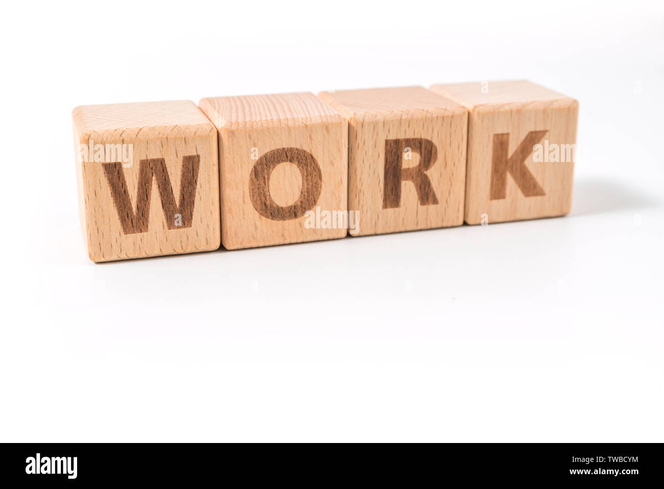 Work wooden blocks of business concept isolated on white background ...
