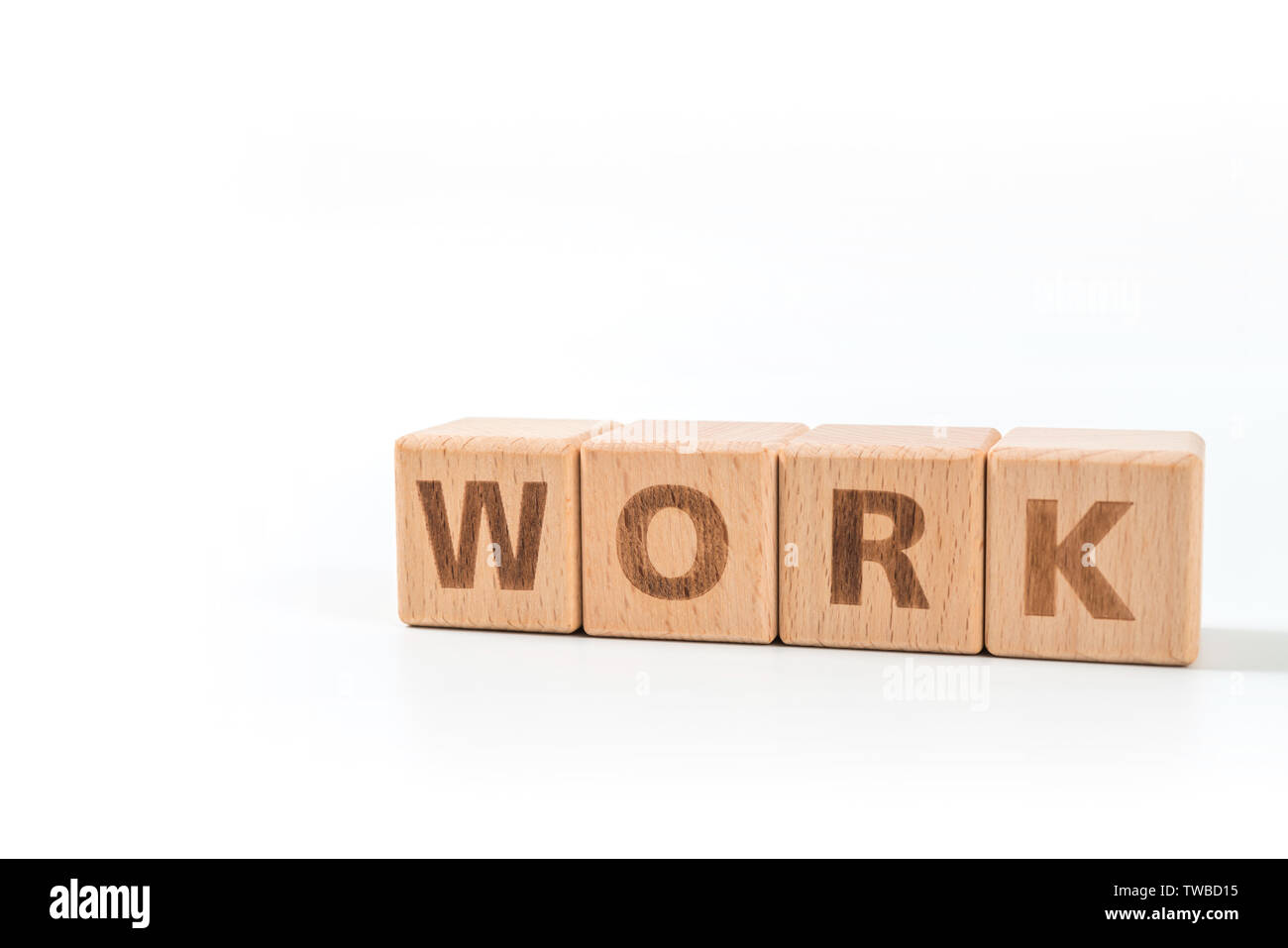 Work wooden blocks of business concept isolated on white background ...