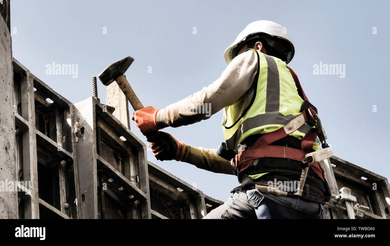 Construction Worker Holding Hammer High Resolution Stock Photography ...