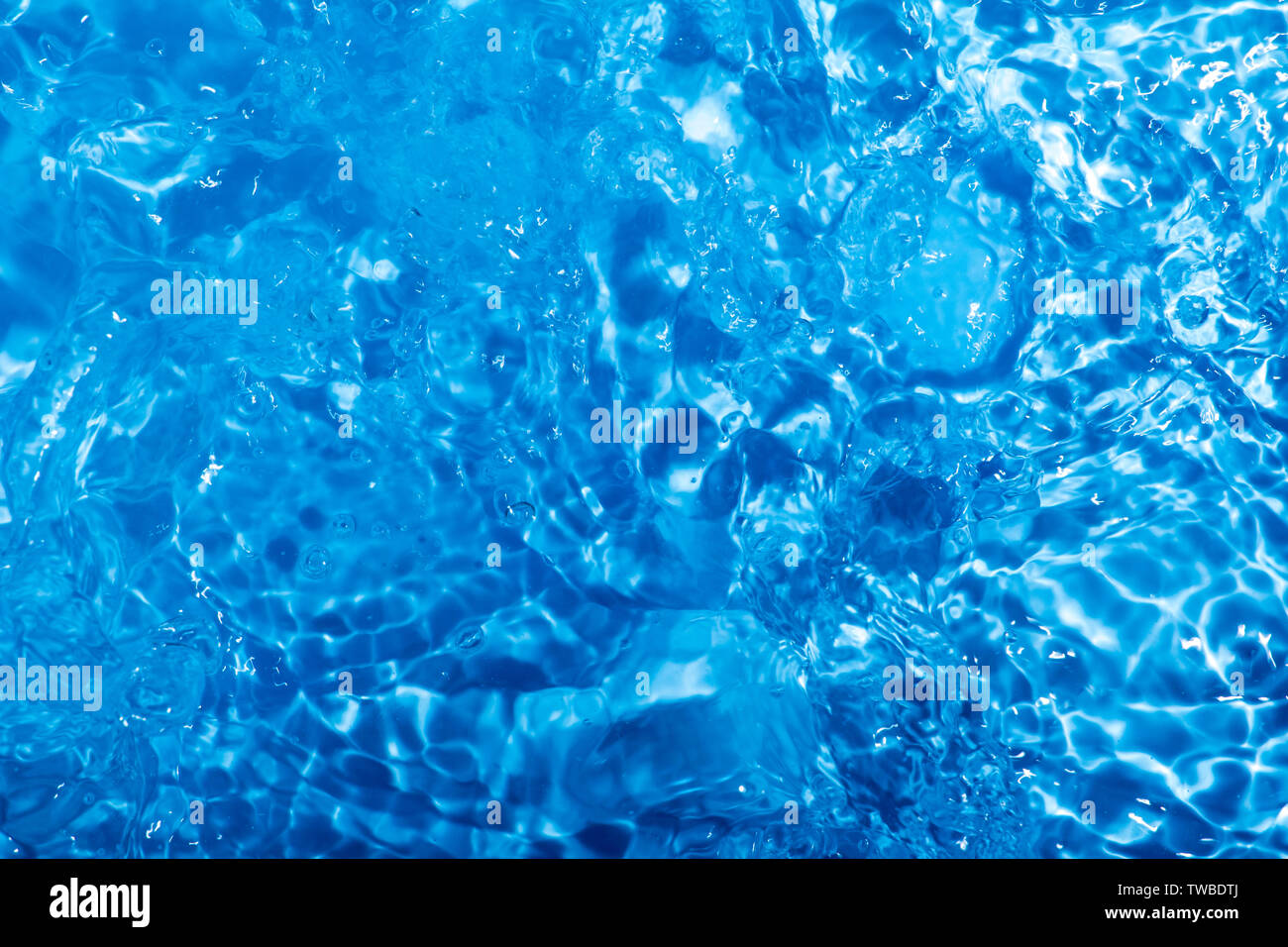Crystal clear water ripples Stock Photo - Alamy