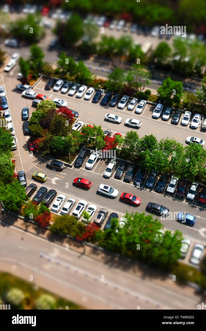 Shaft-shifting effect in a parking lot full of vehicles Stock Photo - Alamy