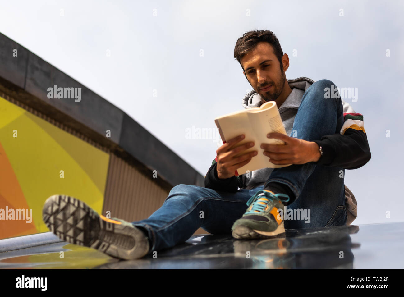 Bearded man reading hi-res stock photography and images - Alamy