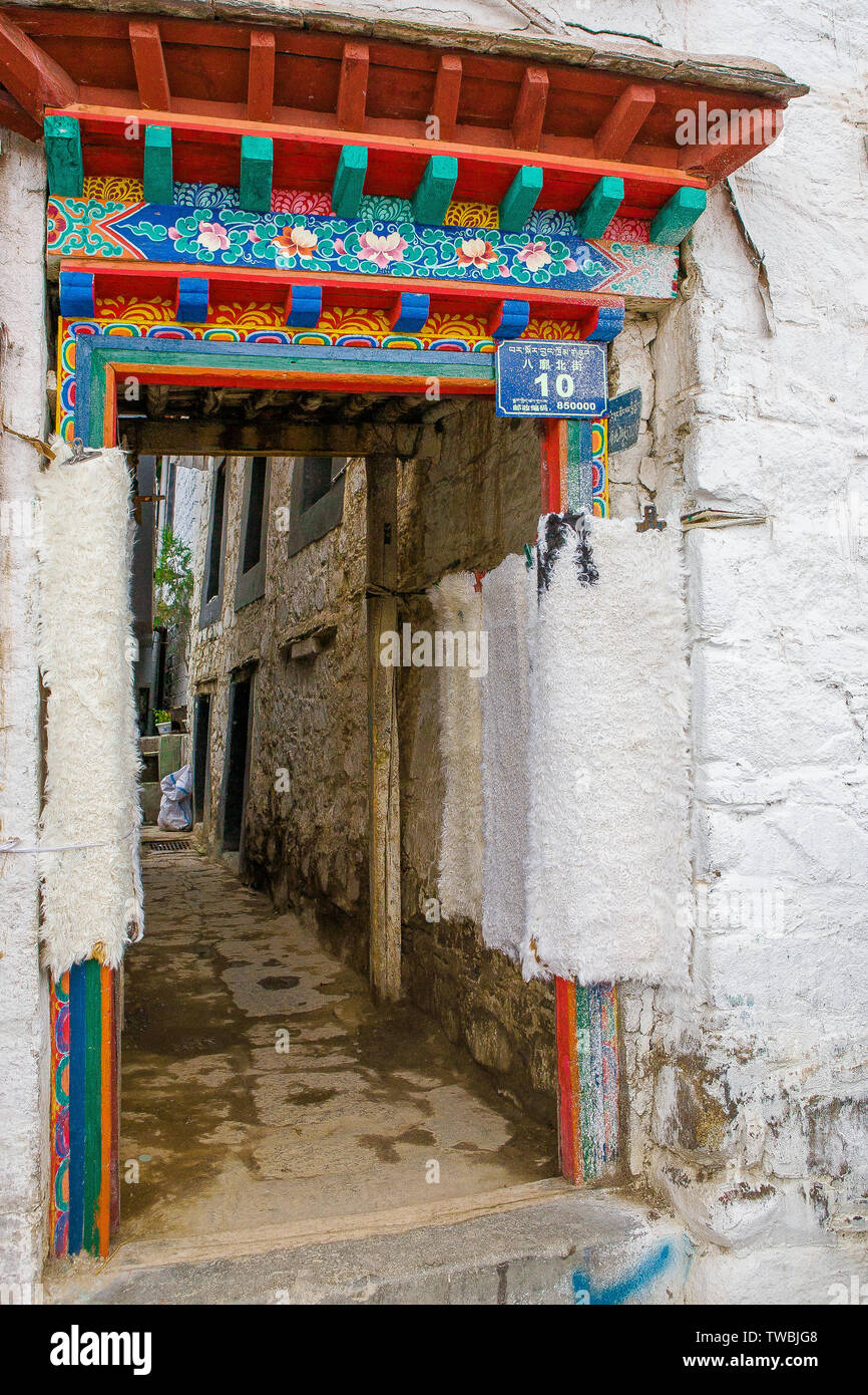 Close-up of door frames of Tibetan buildings on Baghor Street, Lhasa ...
