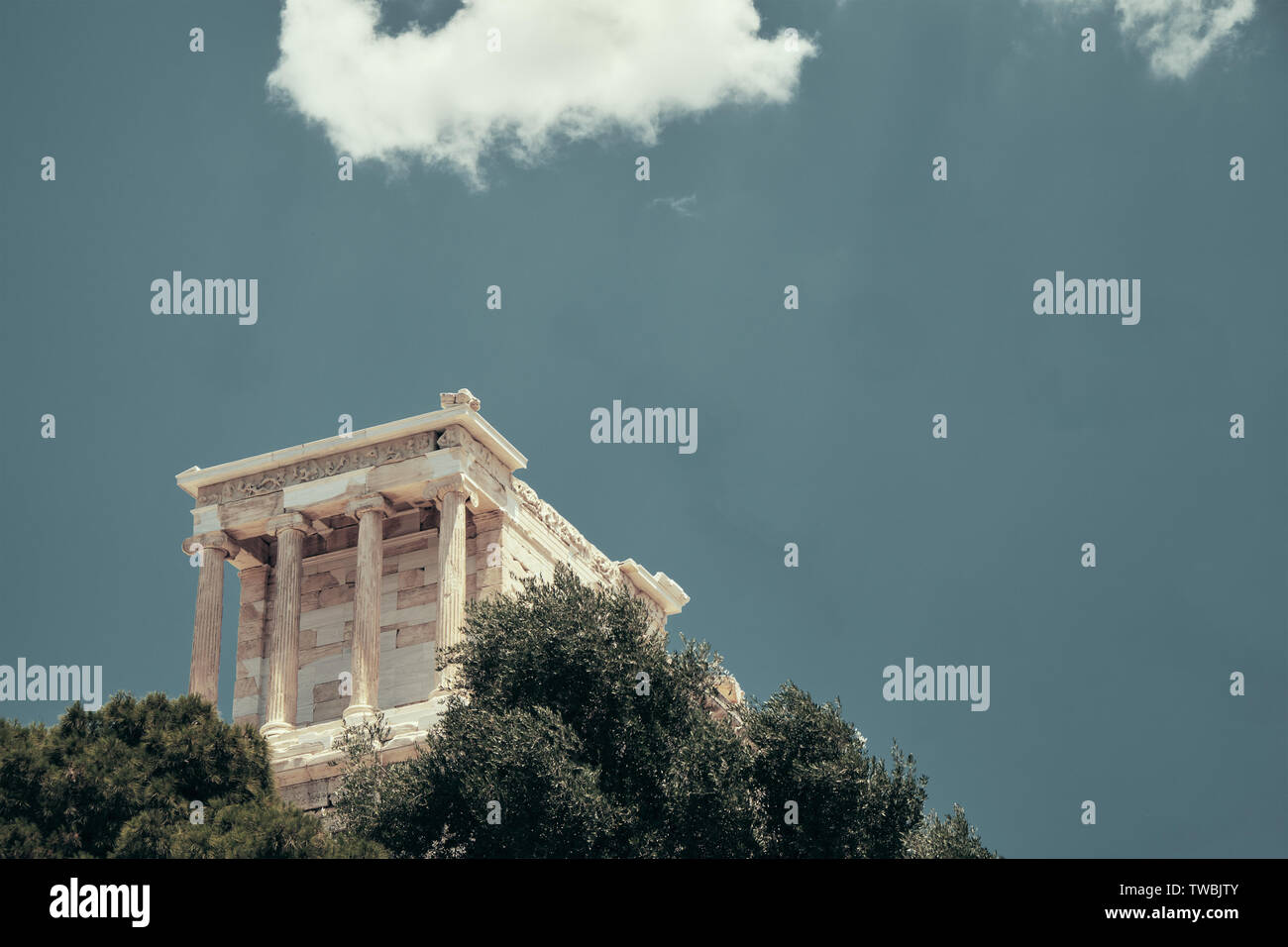 Ancient temple and clear blue sky and clouds in the Acropolis in a ...
