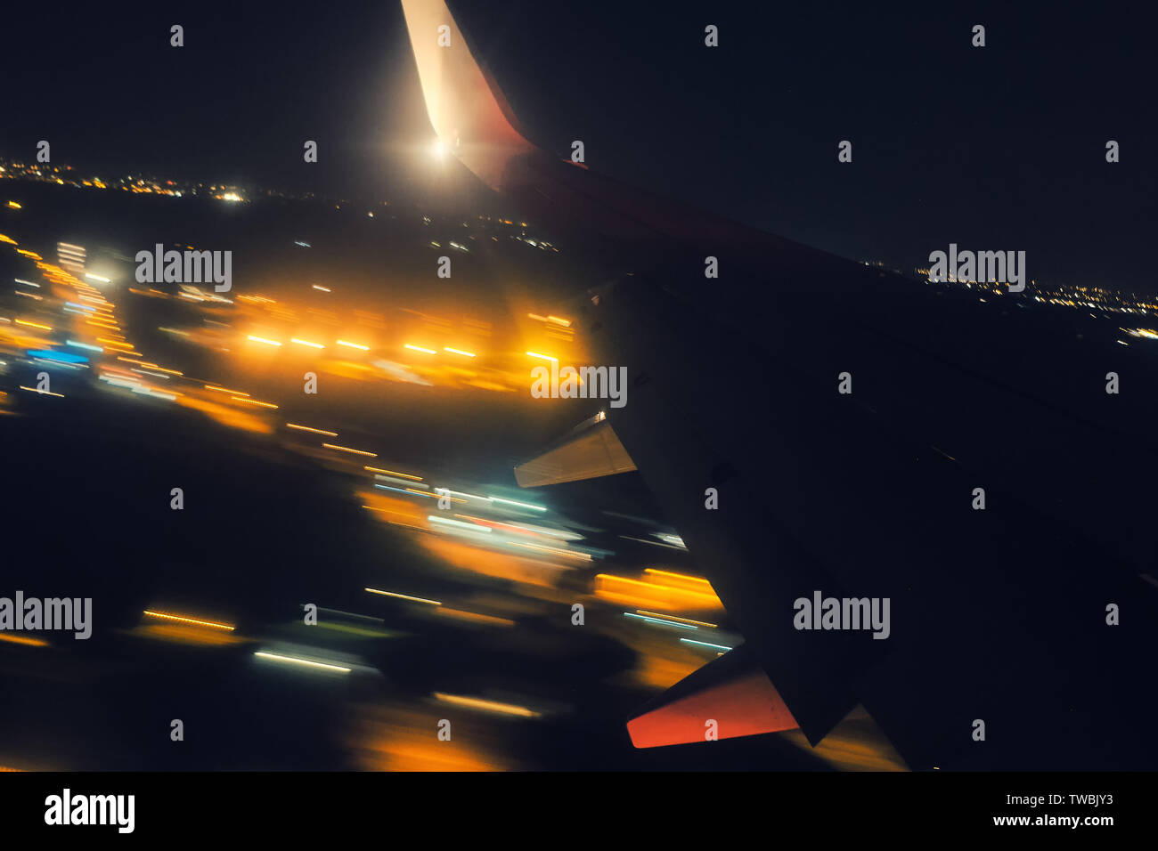 departure operation at night with colorful light motion trials - before ...