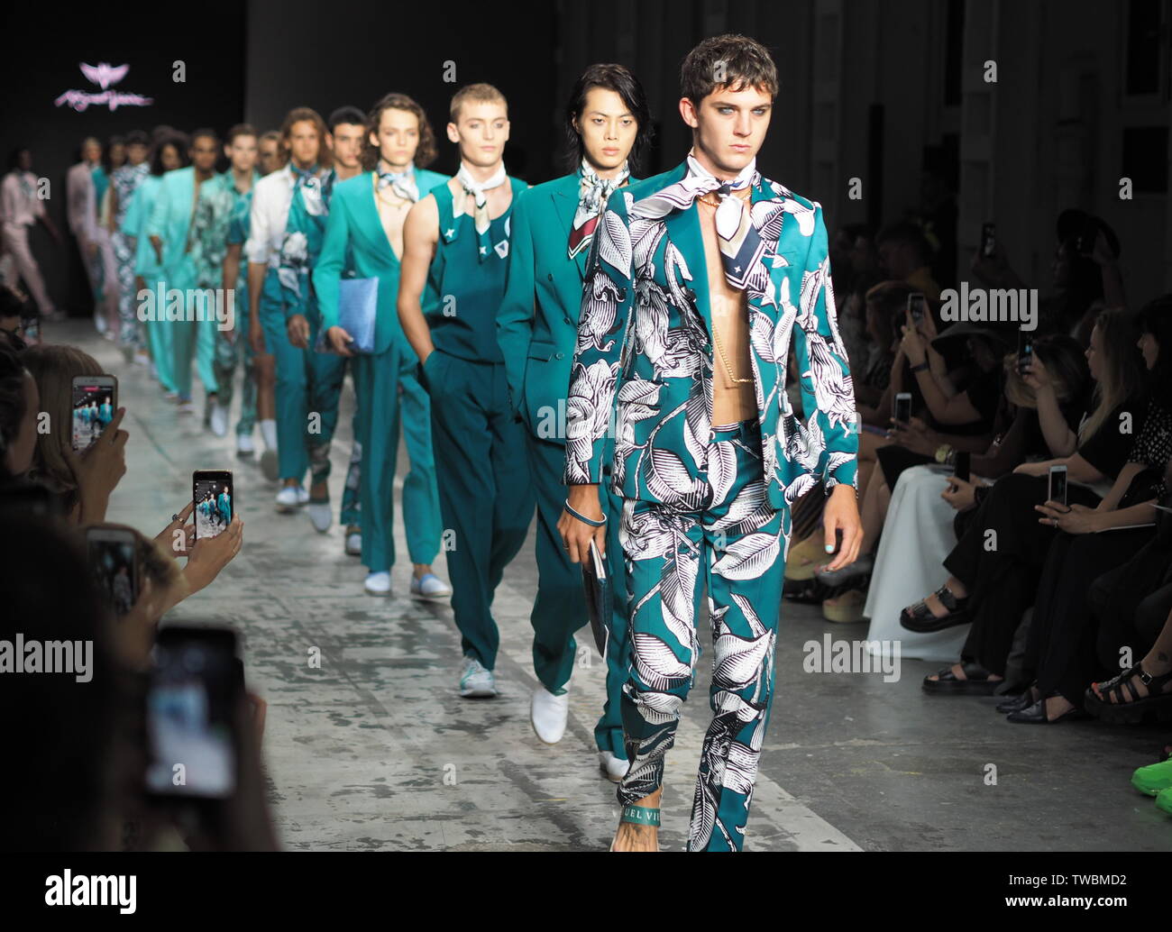 MILAN, ITALY - June 17: Models parade on catwalk for Miguel Vieira ...