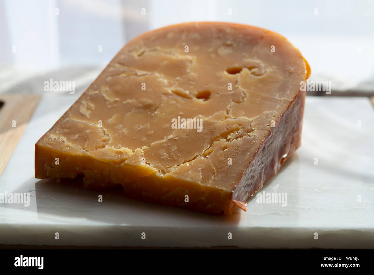 Cheese collection, one piece of three years old dark yellow hard Dutch ...