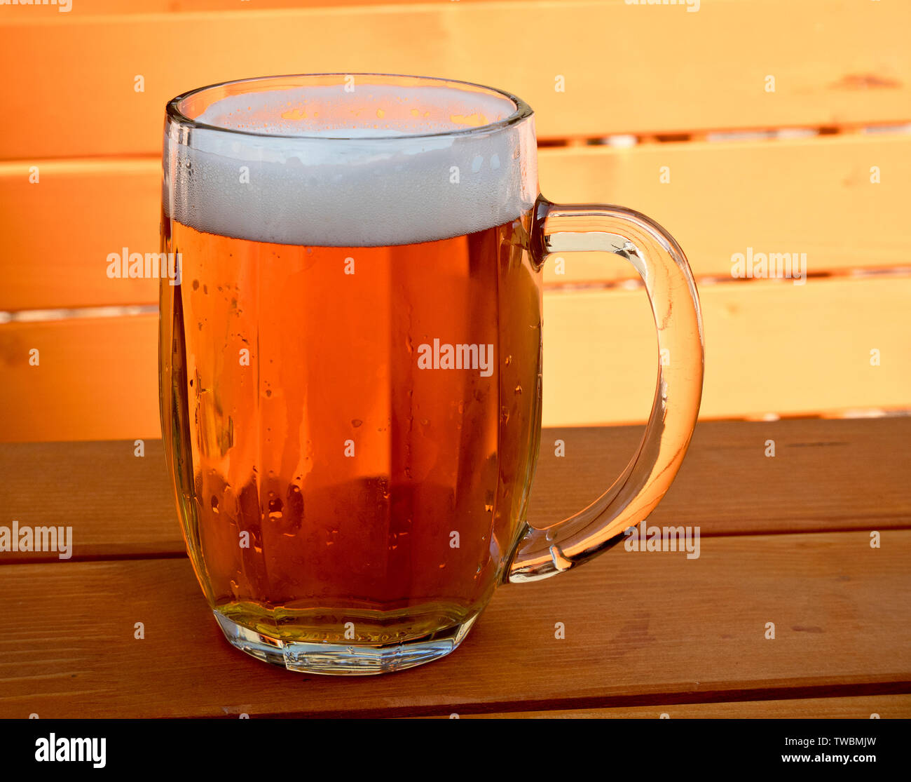 Beer on the desk in a garden restaurant Stock Photo - Alamy