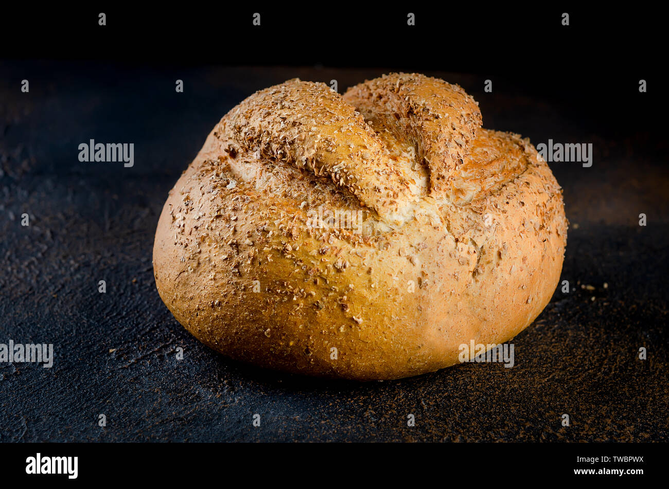 Circle Loaf of Rye bread on black background, healthy concept, copy ...