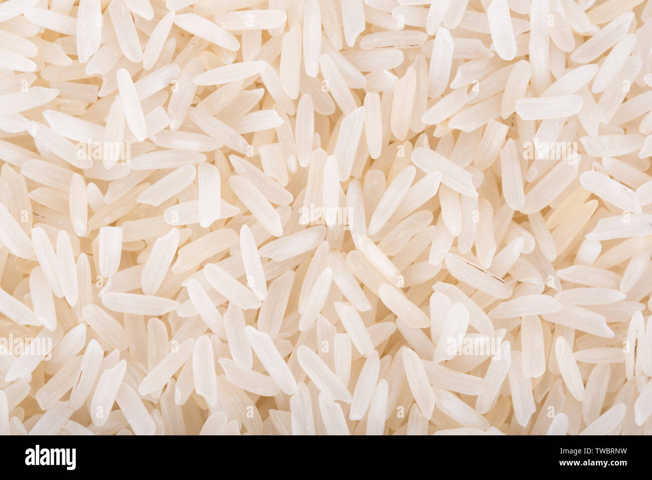Pile of white rice background Stock Photo - Alamy