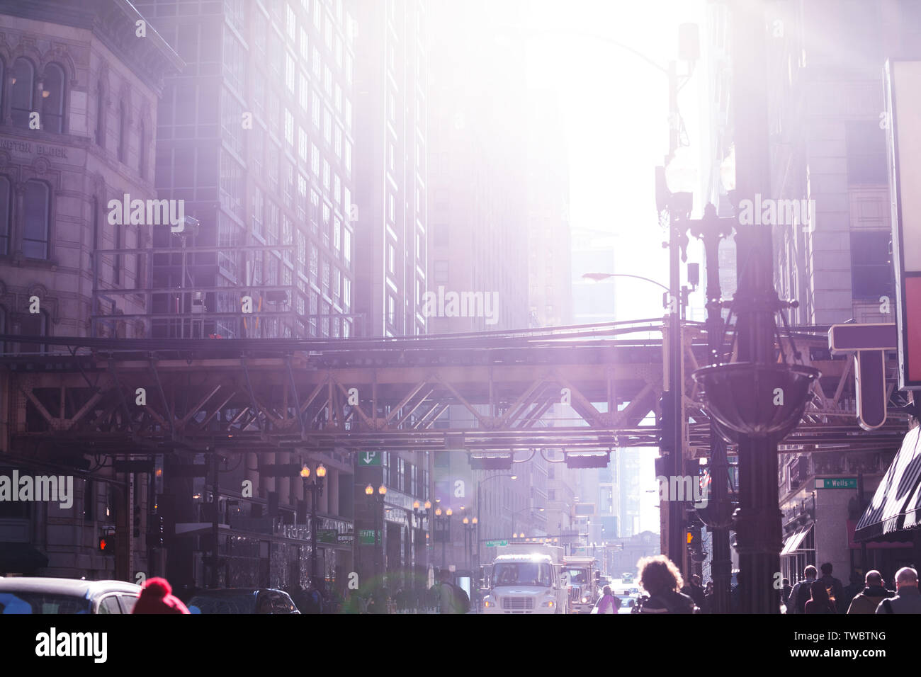 Street view and metro bridge in busy city of Chicago, Illinois, USA ...