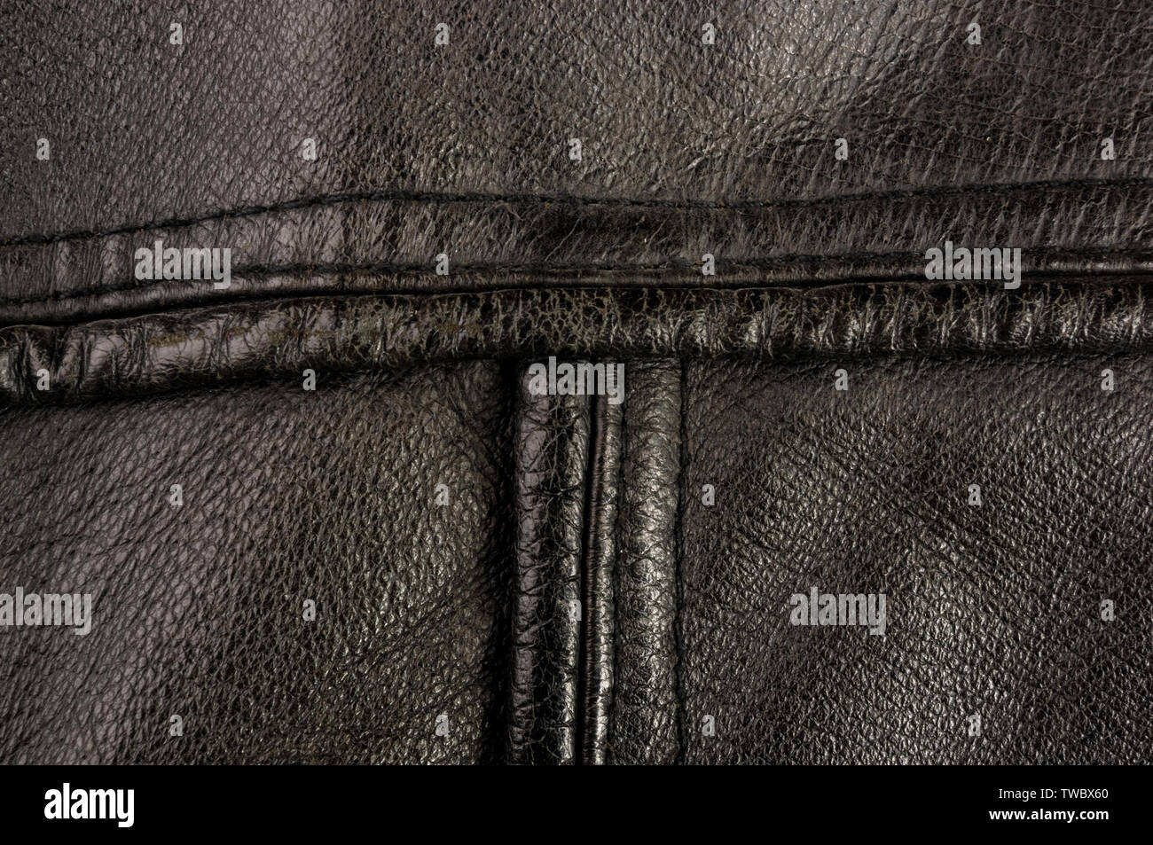 Old vintage genuine soft black leather texture background, top layer ...