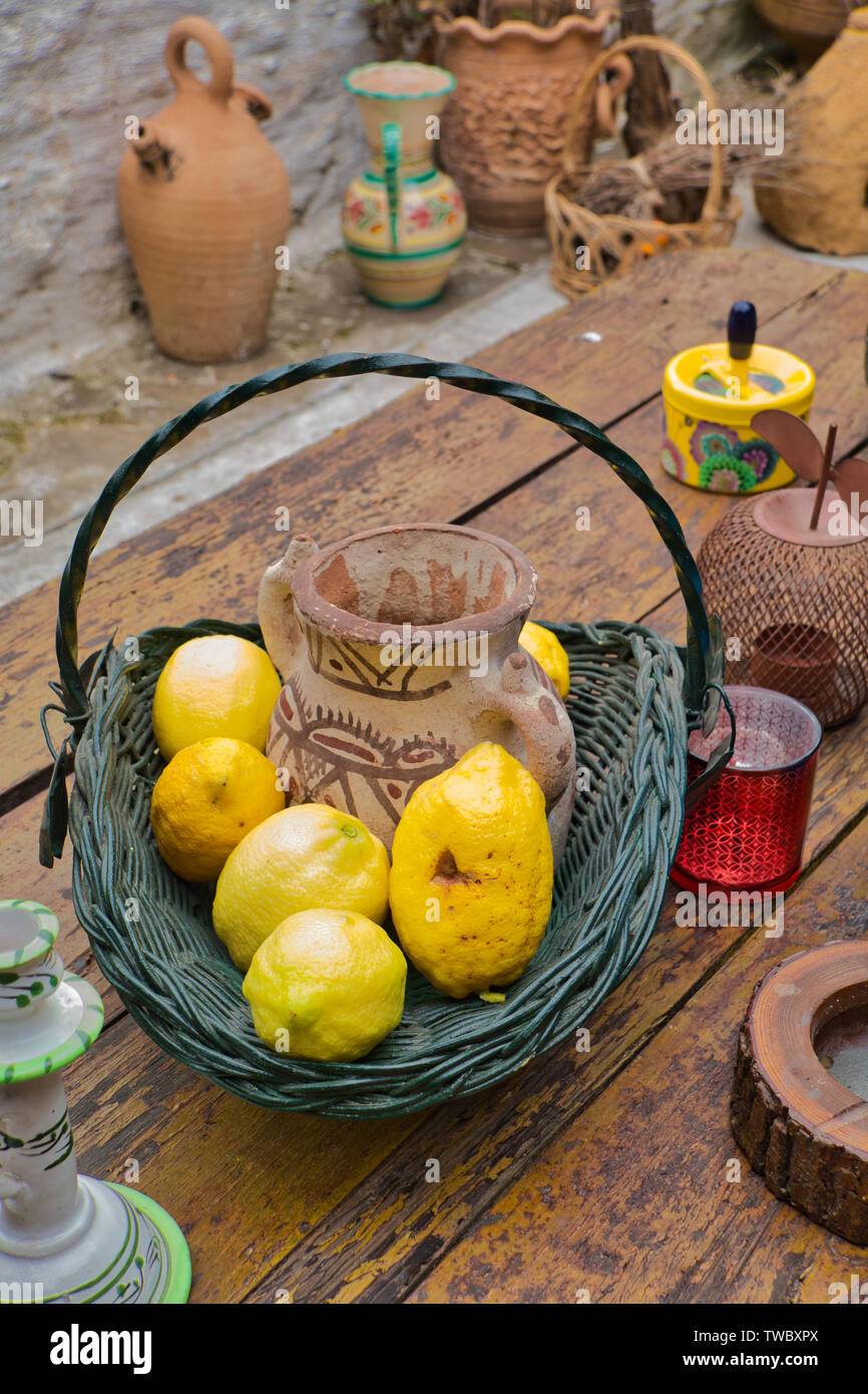 Still life. Objects of garden decoration. Lemon Stock Photo - Alamy