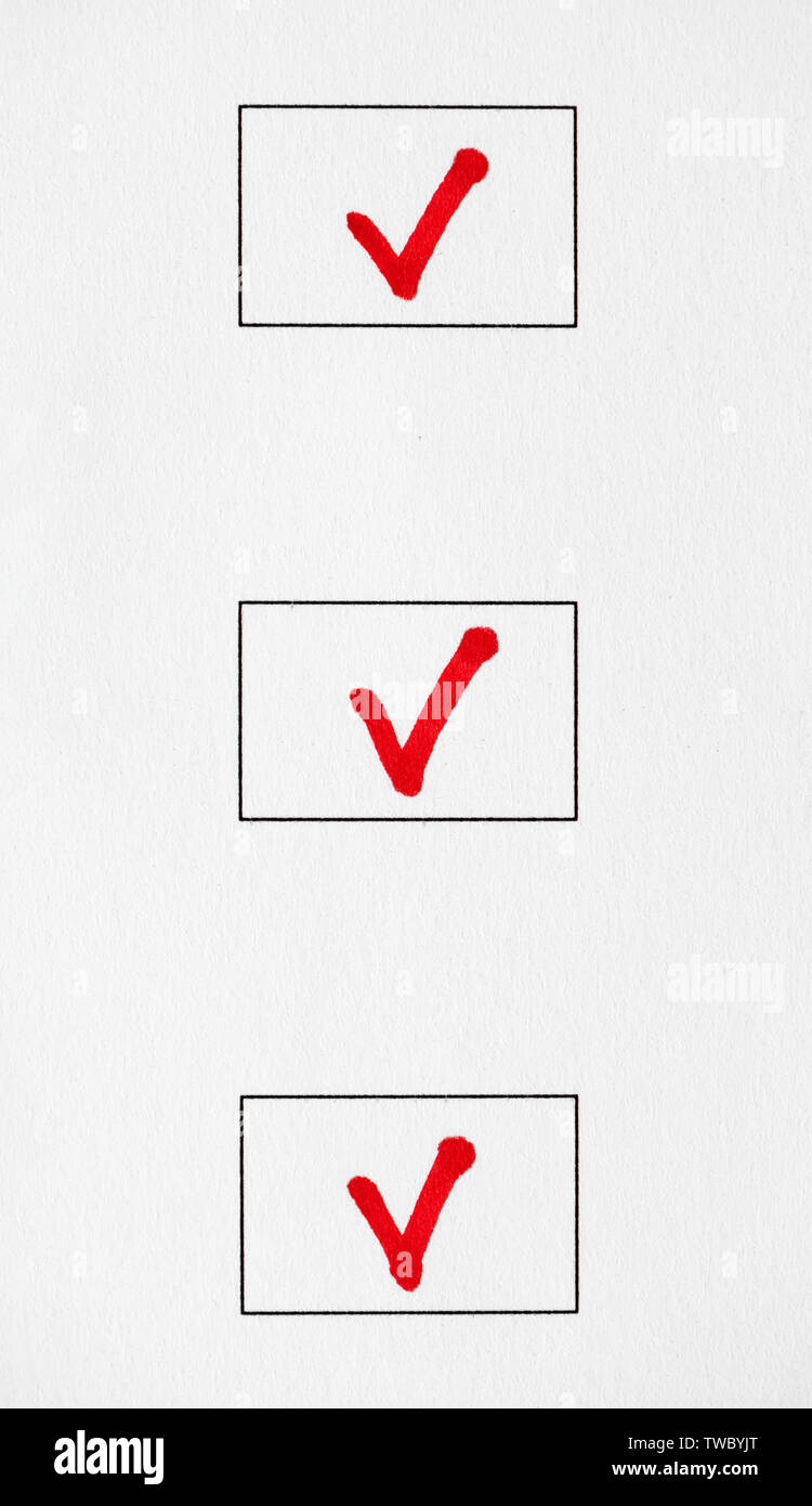 Red check mark drawn with marker on paper, macro photo Stock Photo - Alamy