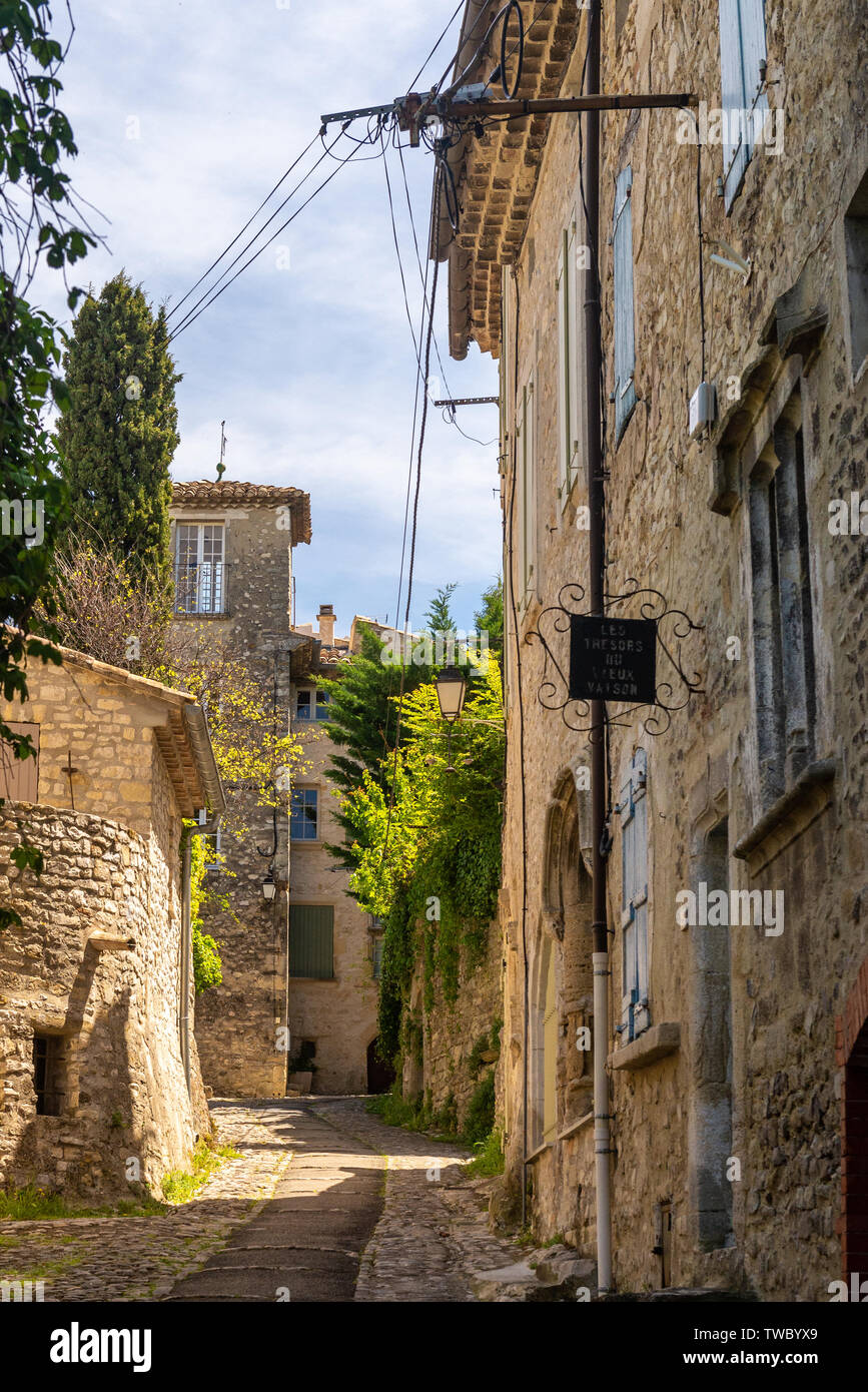 The town of Vaison-la-Romaine straddles the Ouveze river. With Roman ...