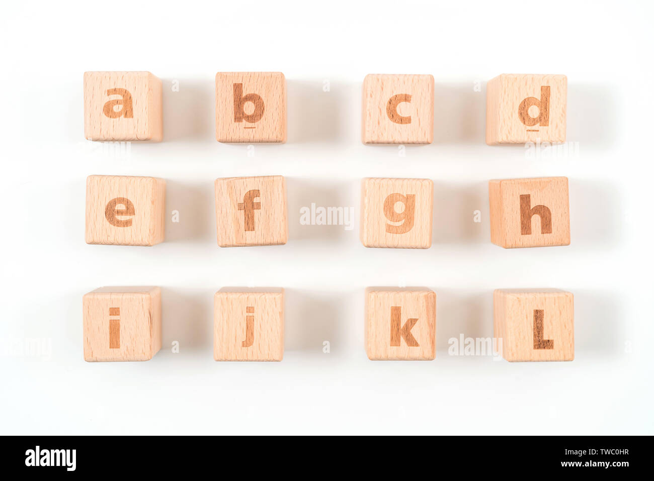Alphabet on wood ,white background Stock Photo - Alamy