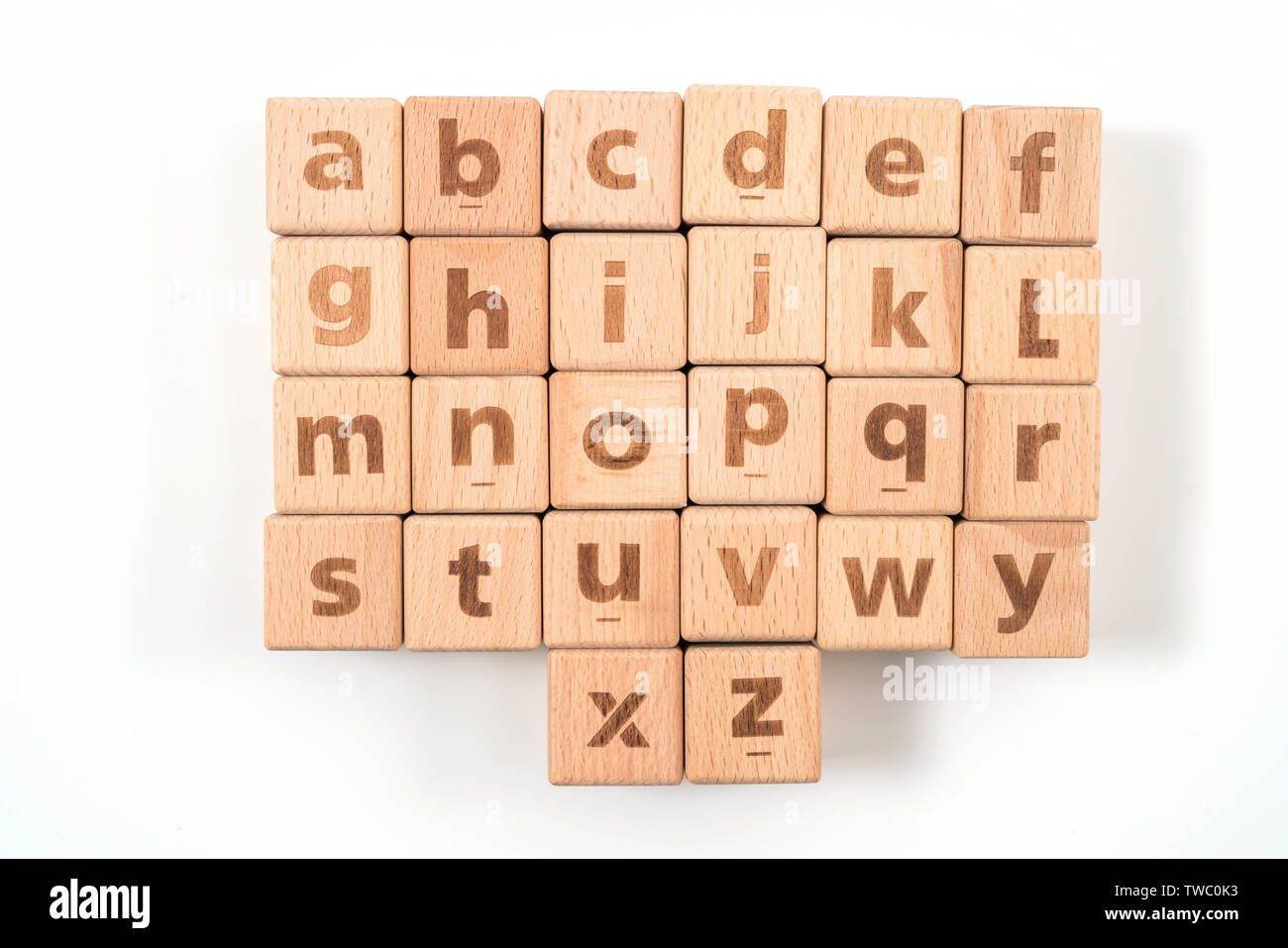 Alphabet on wood ,white background Stock Photo - Alamy