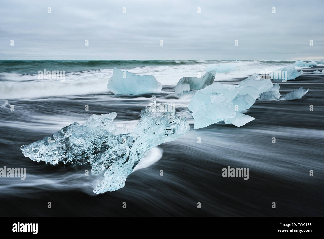 Icy beach in Iceland, Europe. Ice on the black volcanic sand on the ...