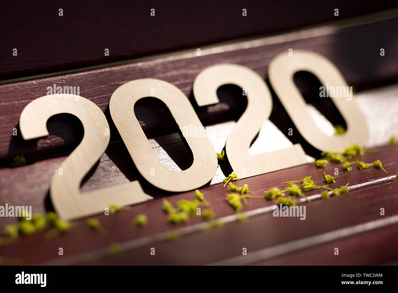 Big wooden handmade 2020 numbers on wooden background with blurred ...