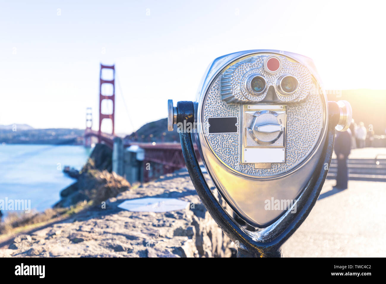touristic telescope with gold gate bridge in sunny sky Stock Photo - Alamy