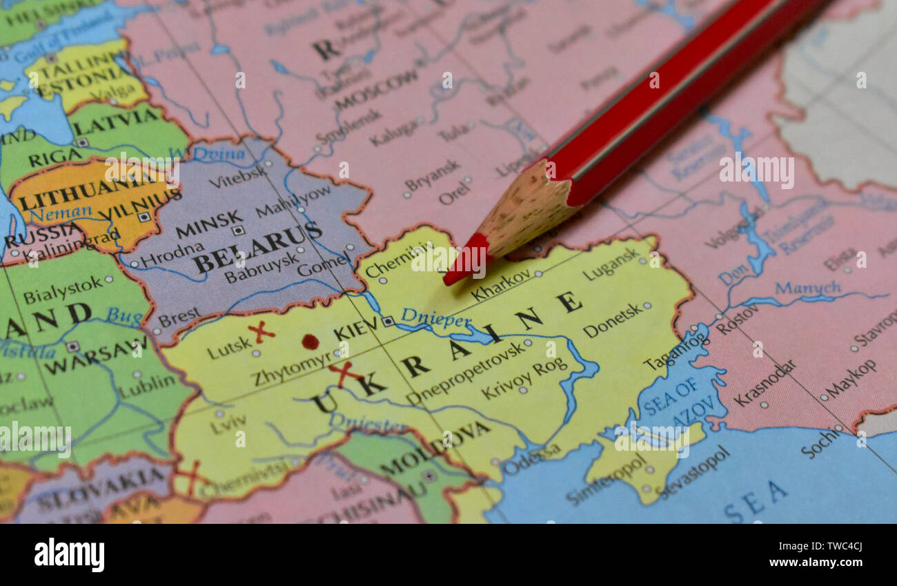 Picture of a red color pencil on a map Stock Photo - Alamy