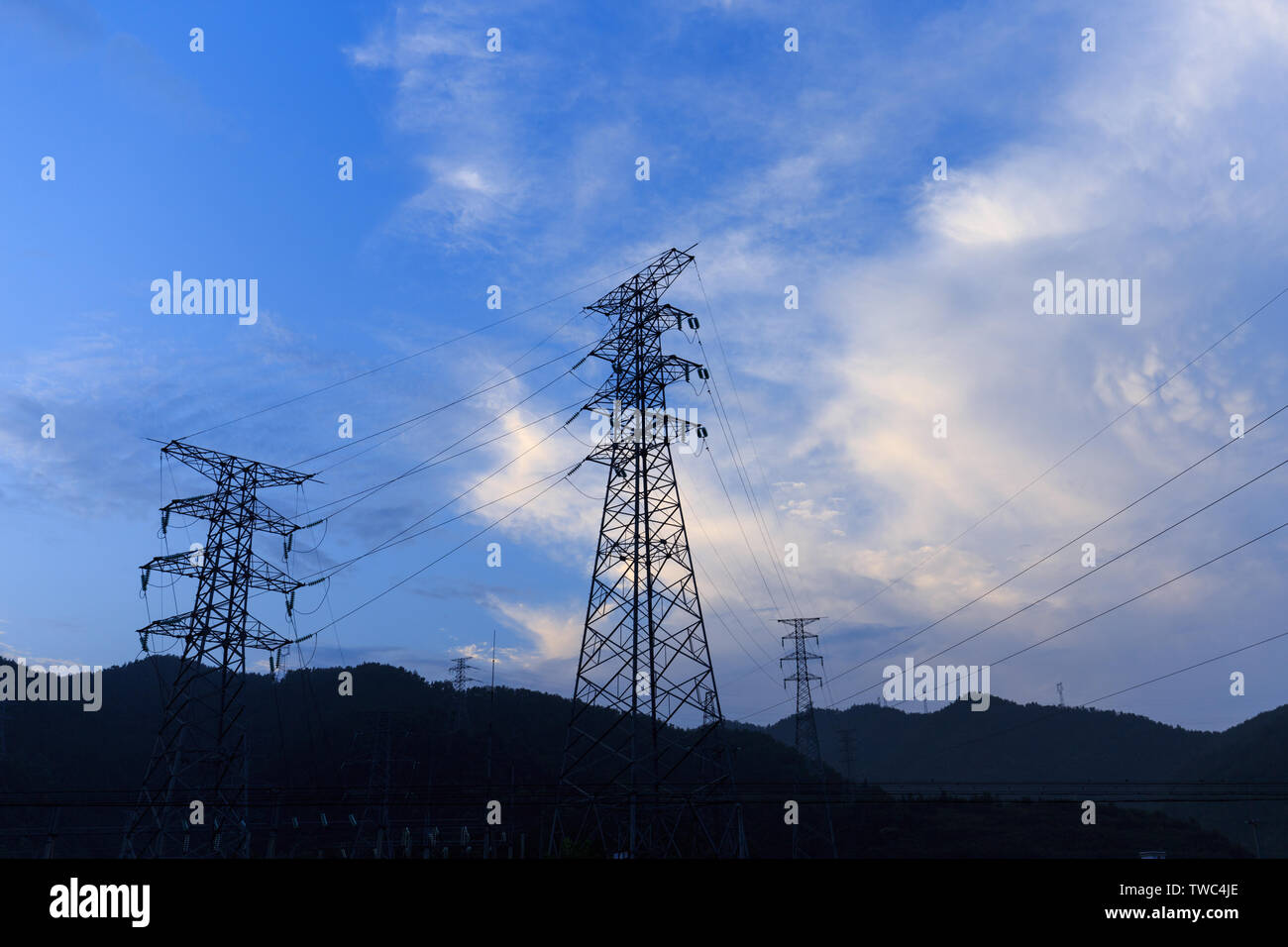 Pylon on hill in bluesky Stock Photo - Alamy