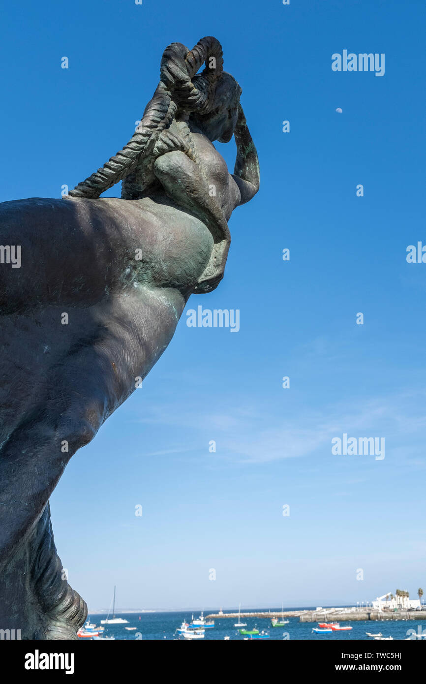 A bronze mermaid statue looking out to sea, Cascais, Portugal Stock ...