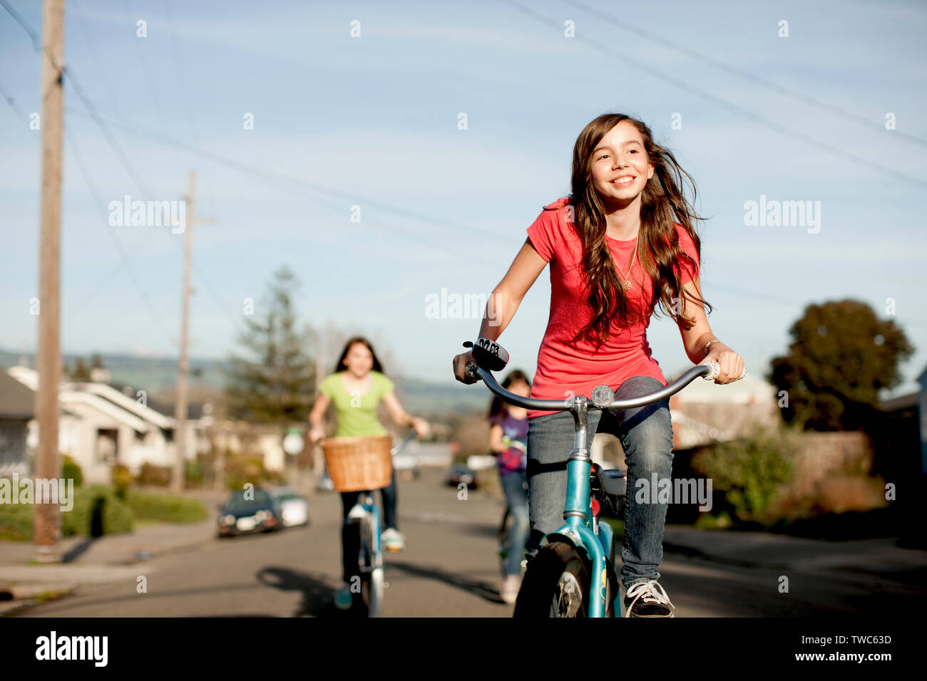 Group of girls cycling hi-res stock photography and images - Alamy