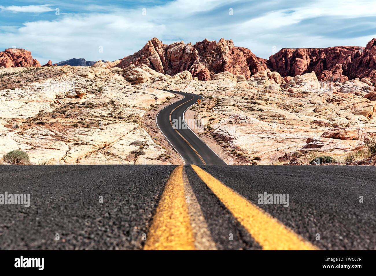 A long road leading towards mountains in Southern Nevada, USA Stock ...