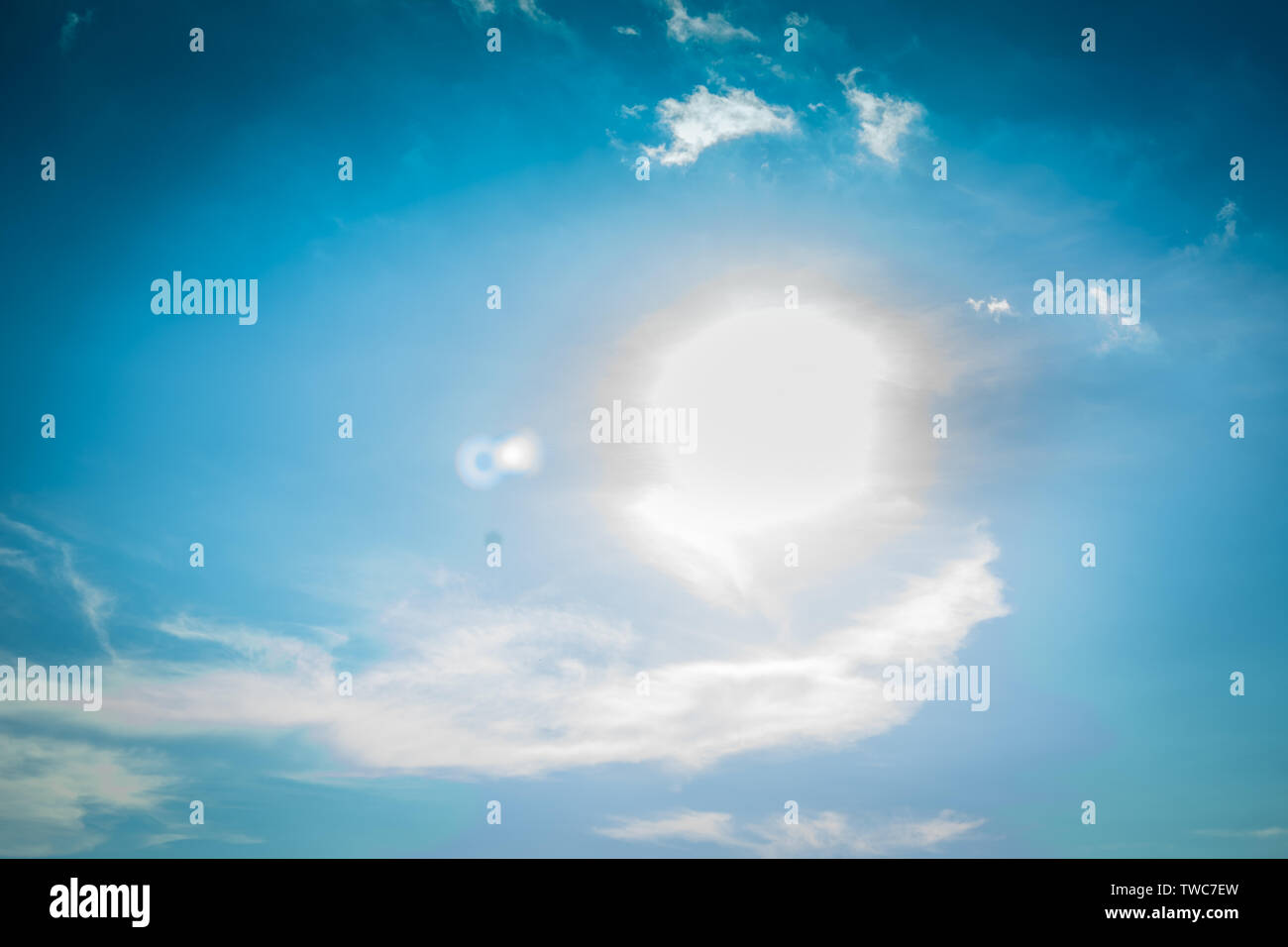 Hot summer or heat wave background, wonderful blue sky with glowing sun ...