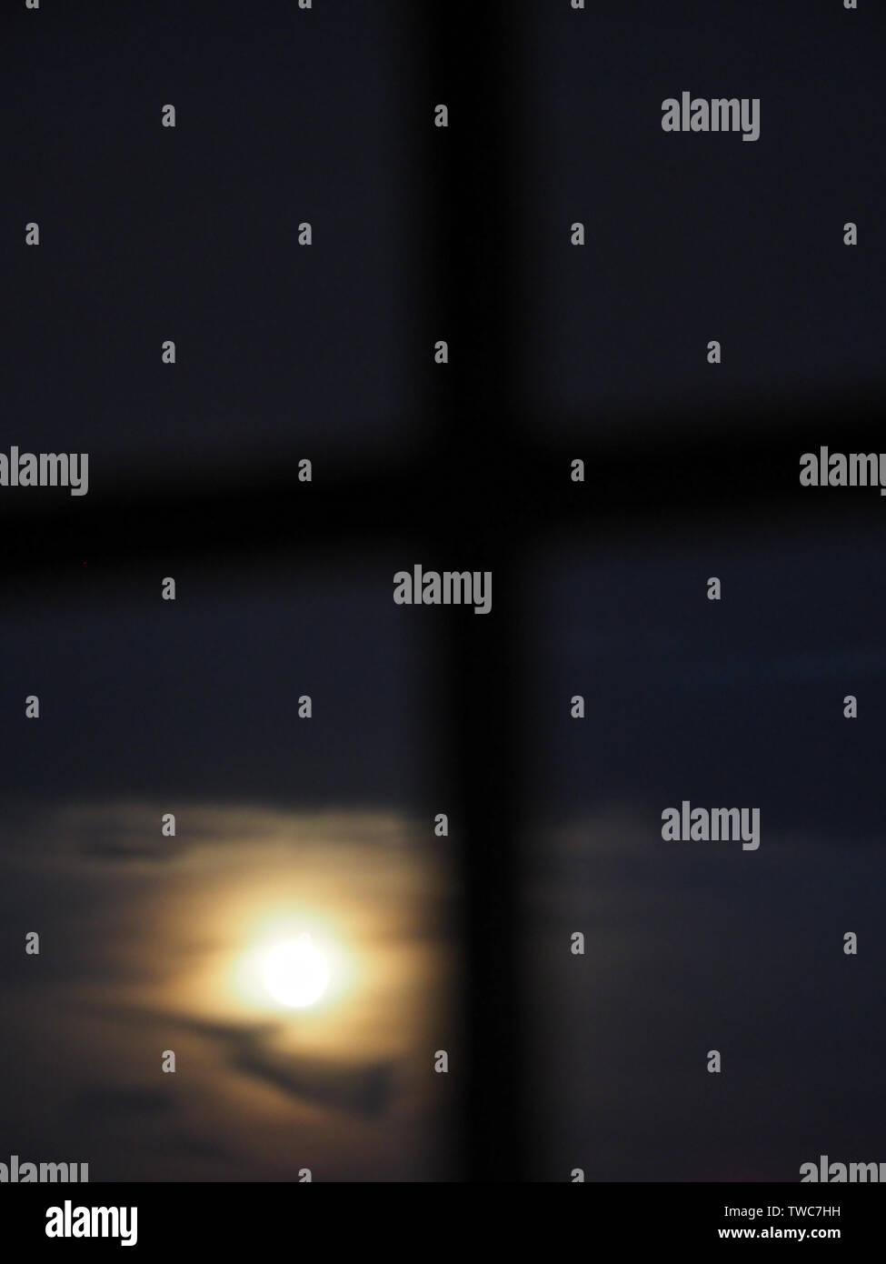 Moon seen through Window Stock Photo - Alamy