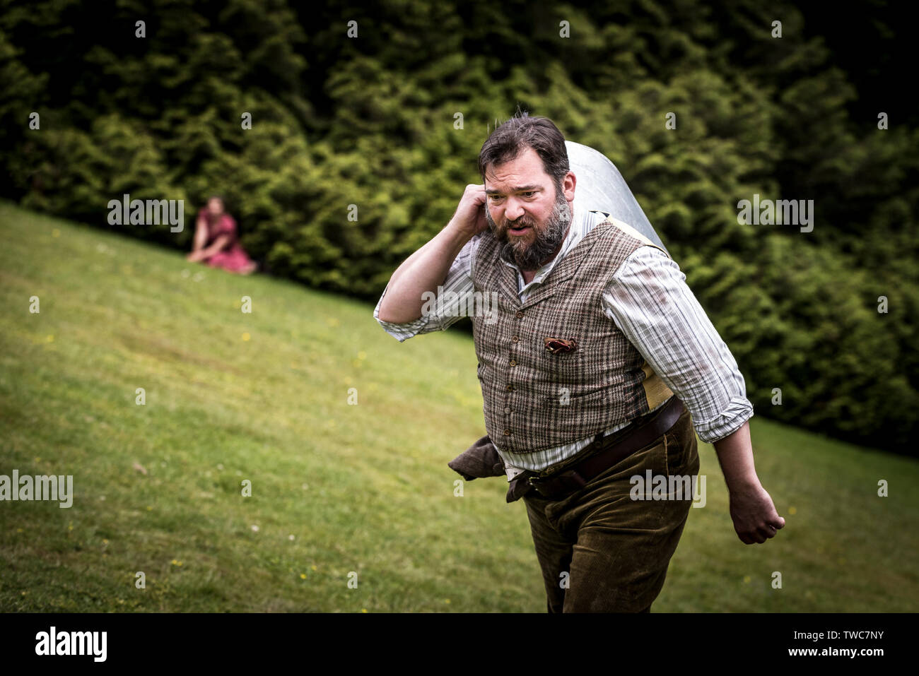 Actor Rory Wilton performing in a scene from the theatre production ...