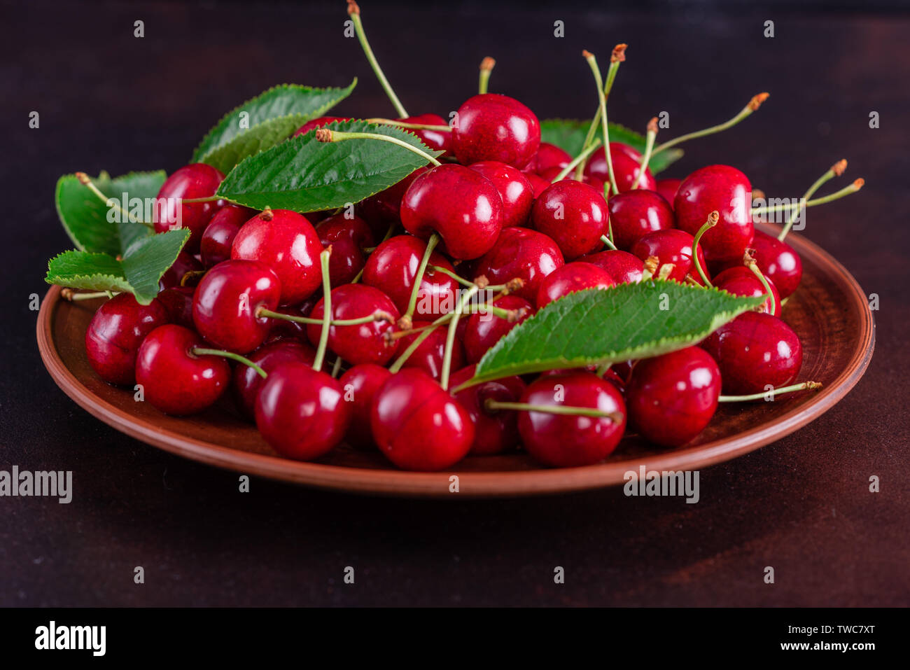 Sweet fresh organic cherry background close-up Stock Photo - Alamy