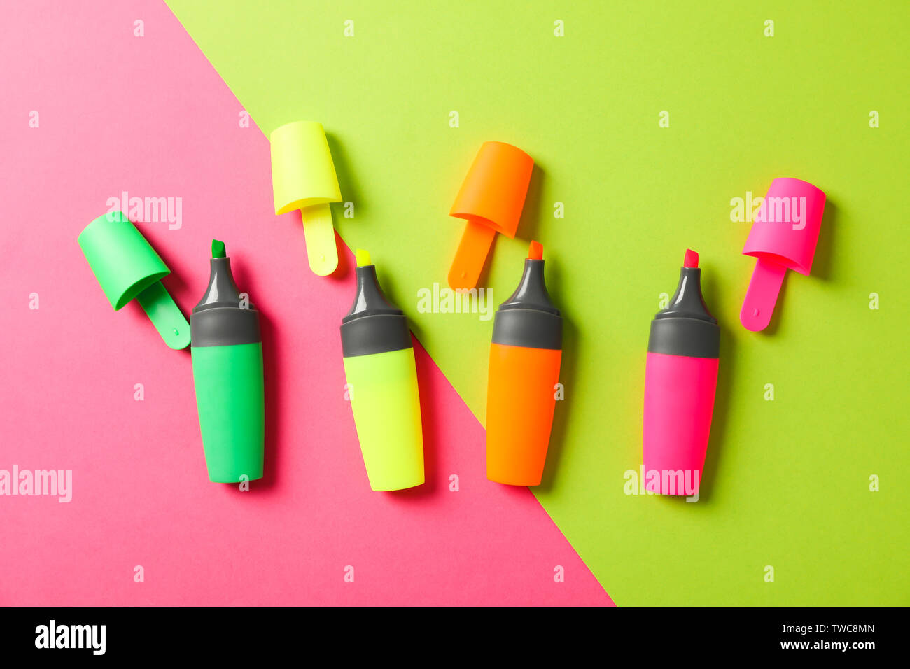 Open highlighters on two tone background, space for text Stock Photo ...
