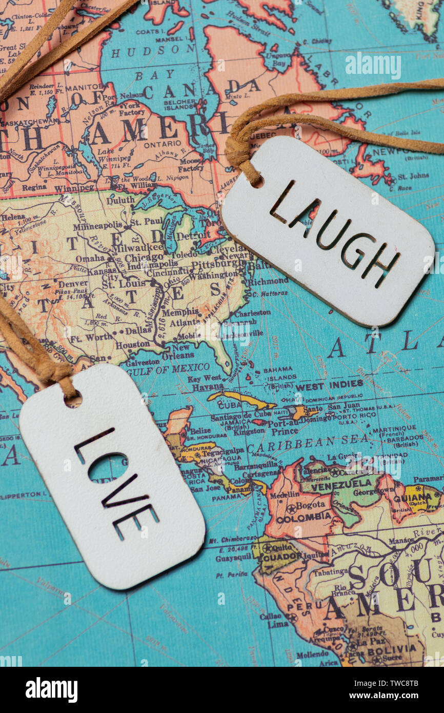 a love sign and a laugh sign on a map Stock Photo - Alamy