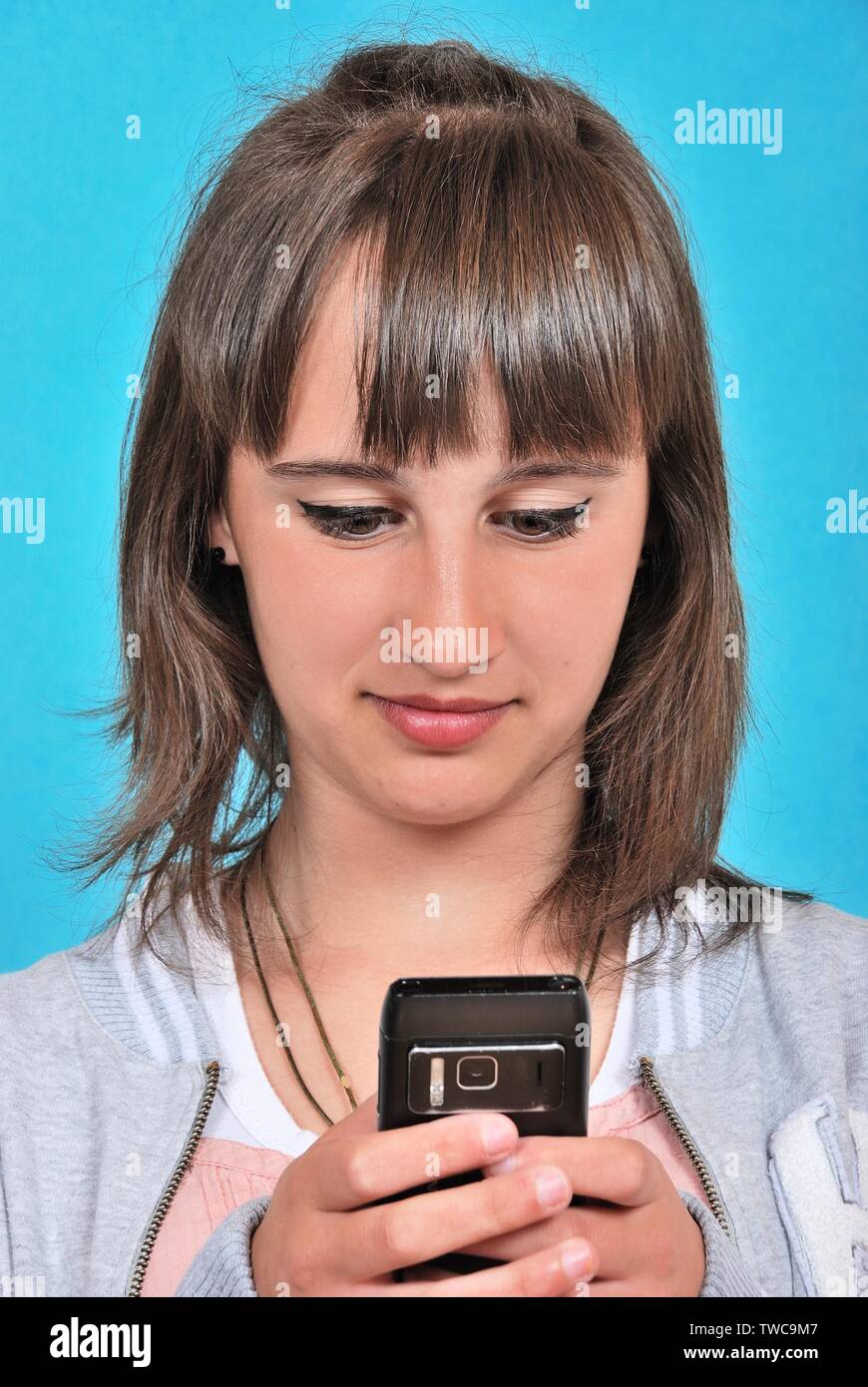 Girl with a mobile phone Stock Photo - Alamy