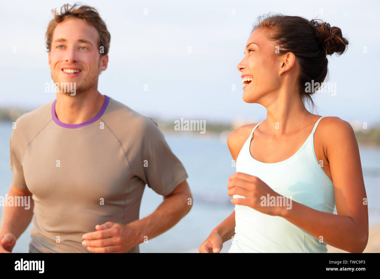 Laughing fitness couple hi-res stock photography and images - Alamy