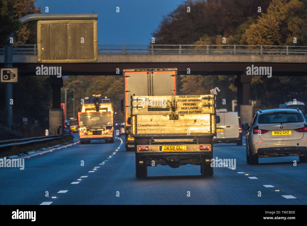 Heavy traffic on a motorway, late afternoon with the warm autumn ...