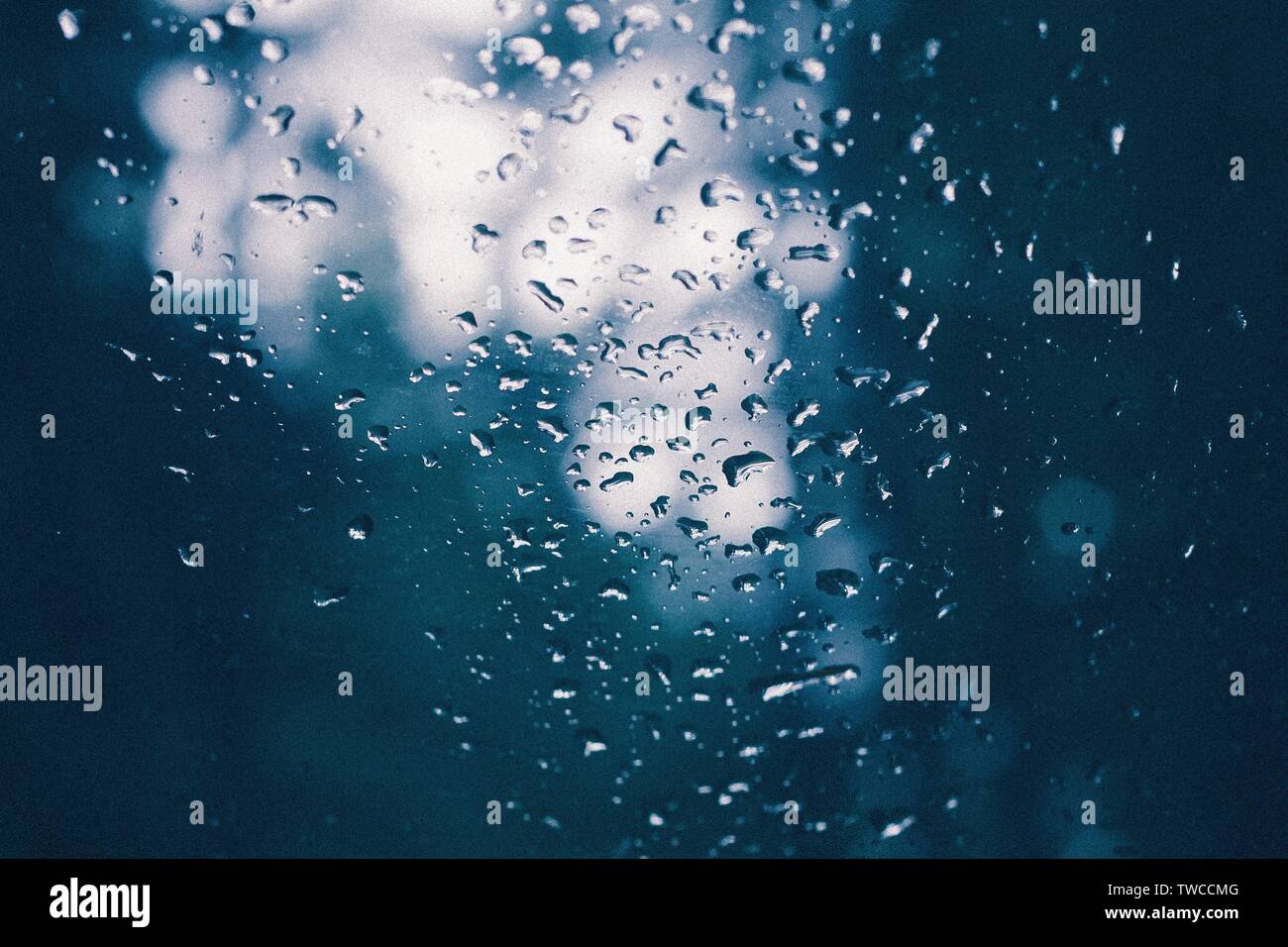 Closeup of a glass with water drips on it after a rain - beautiful ...