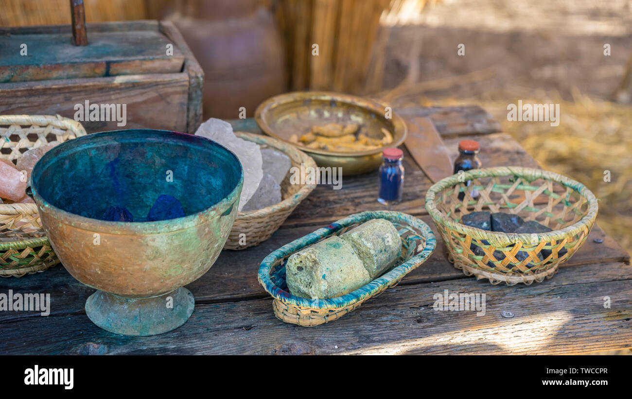 Utensils, handmade dyeing of fabrics and wool in a cauldron with ...