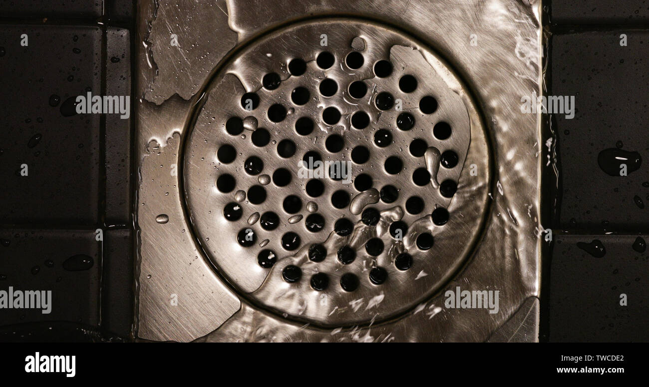 drain hole in the bathroom close-up Stock Photo - Alamy