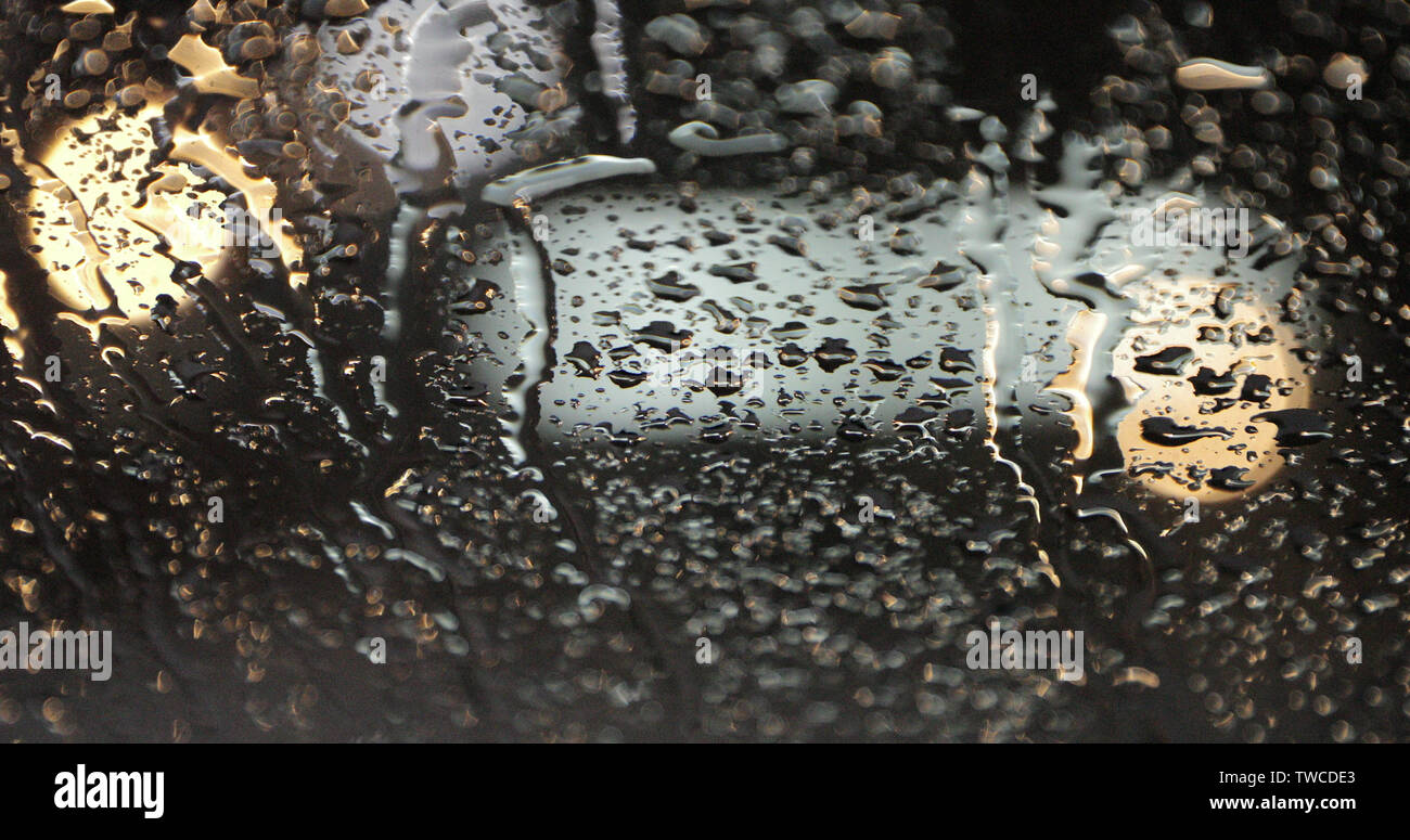 Close up of outside view through car window with water drops Stock ...