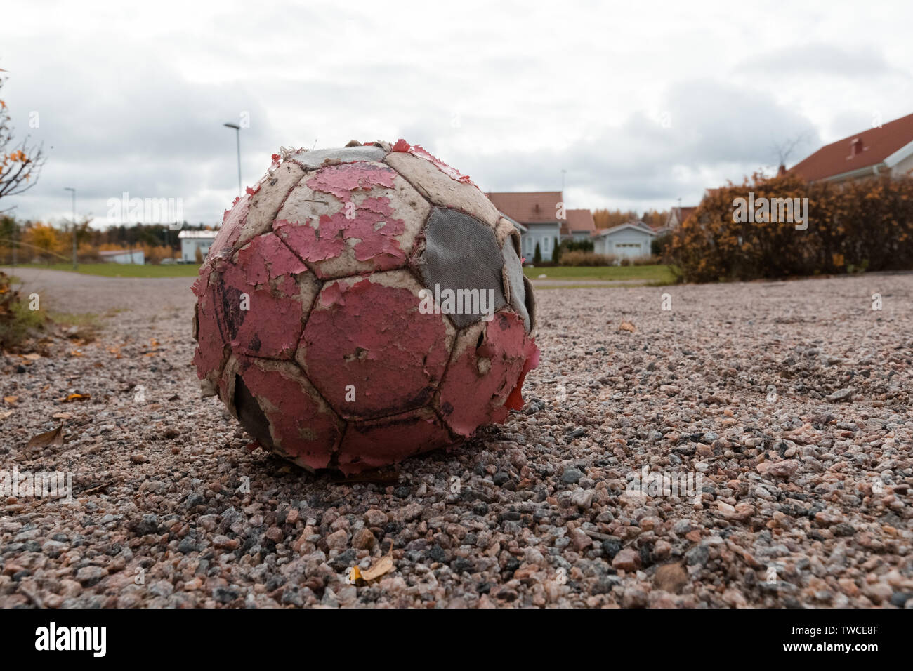 old soccer ball in the yard close-up Stock Photo - Alamy