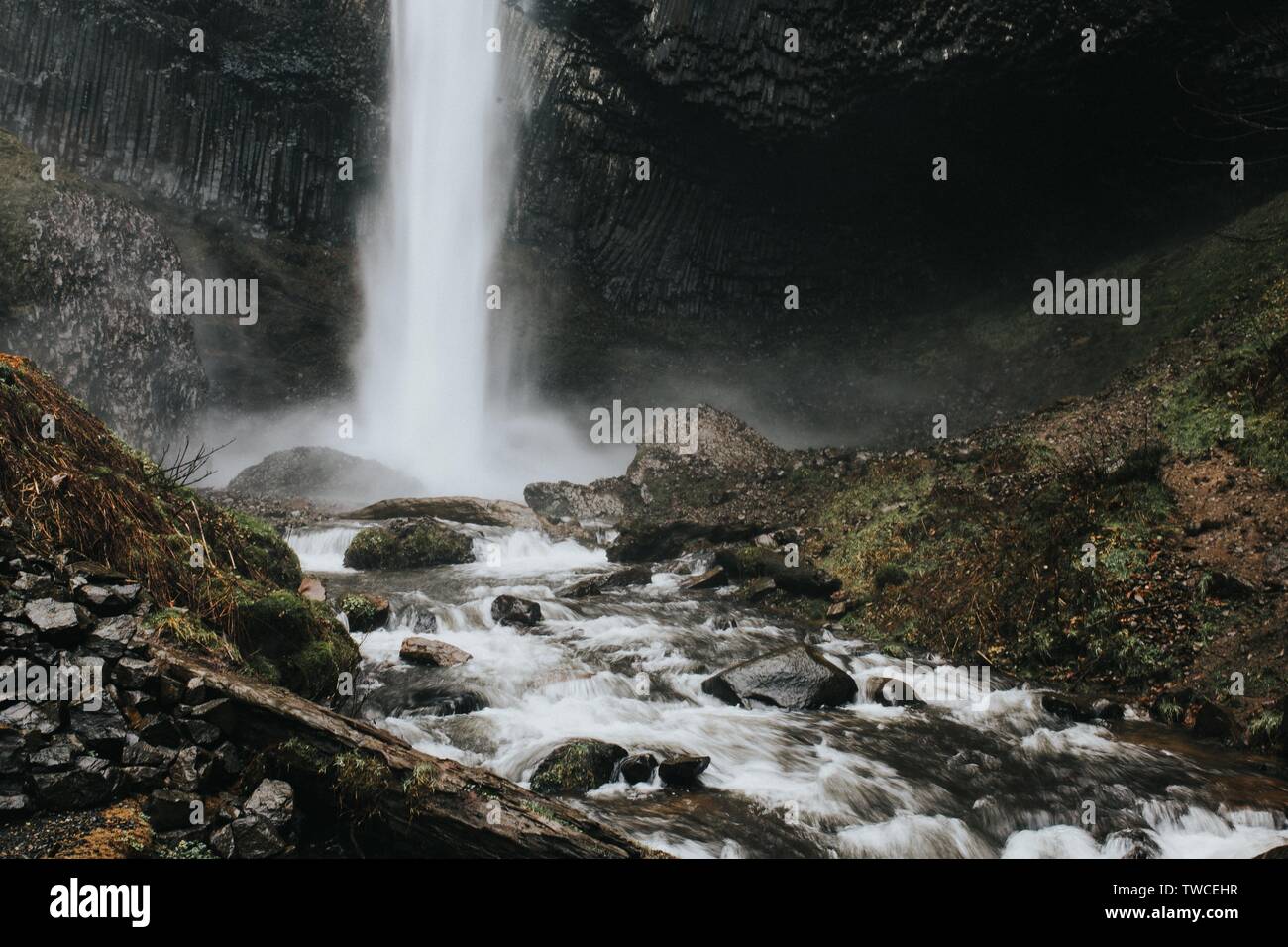 Beautiful waterfall in a rocky steep forest Stock Photo - Alamy