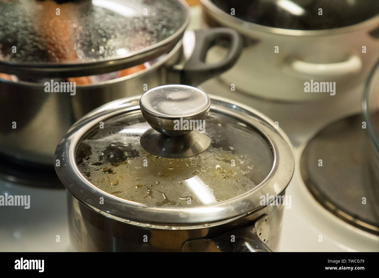 pots in the kitchen closeup Stock Photo - Alamy