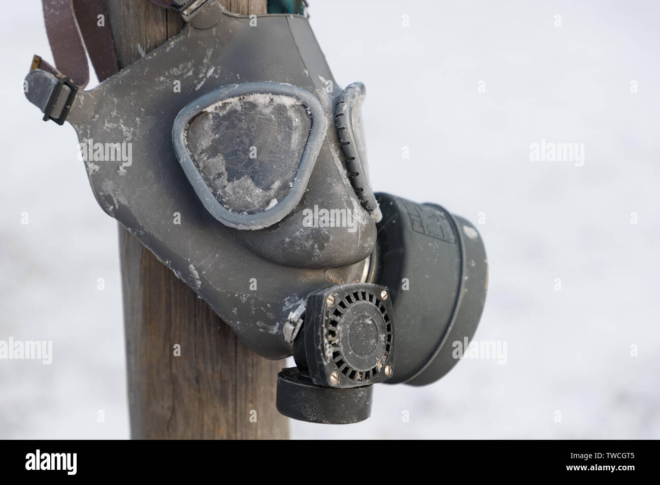 old rubber gas mask on the street in winter Stock Photo - Alamy