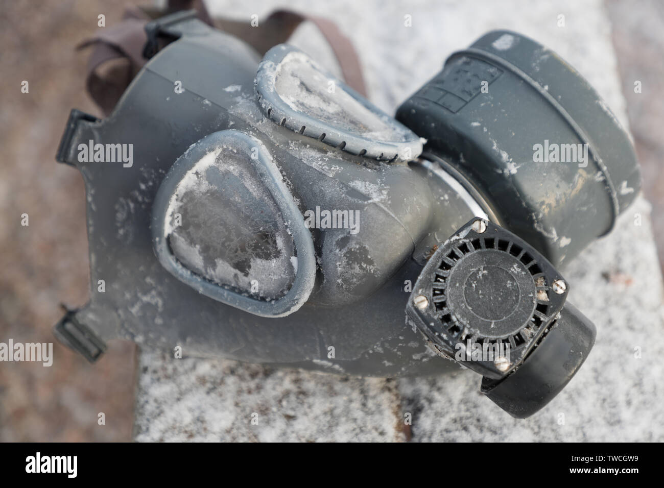 old rubber gas mask on the street in winter Stock Photo - Alamy