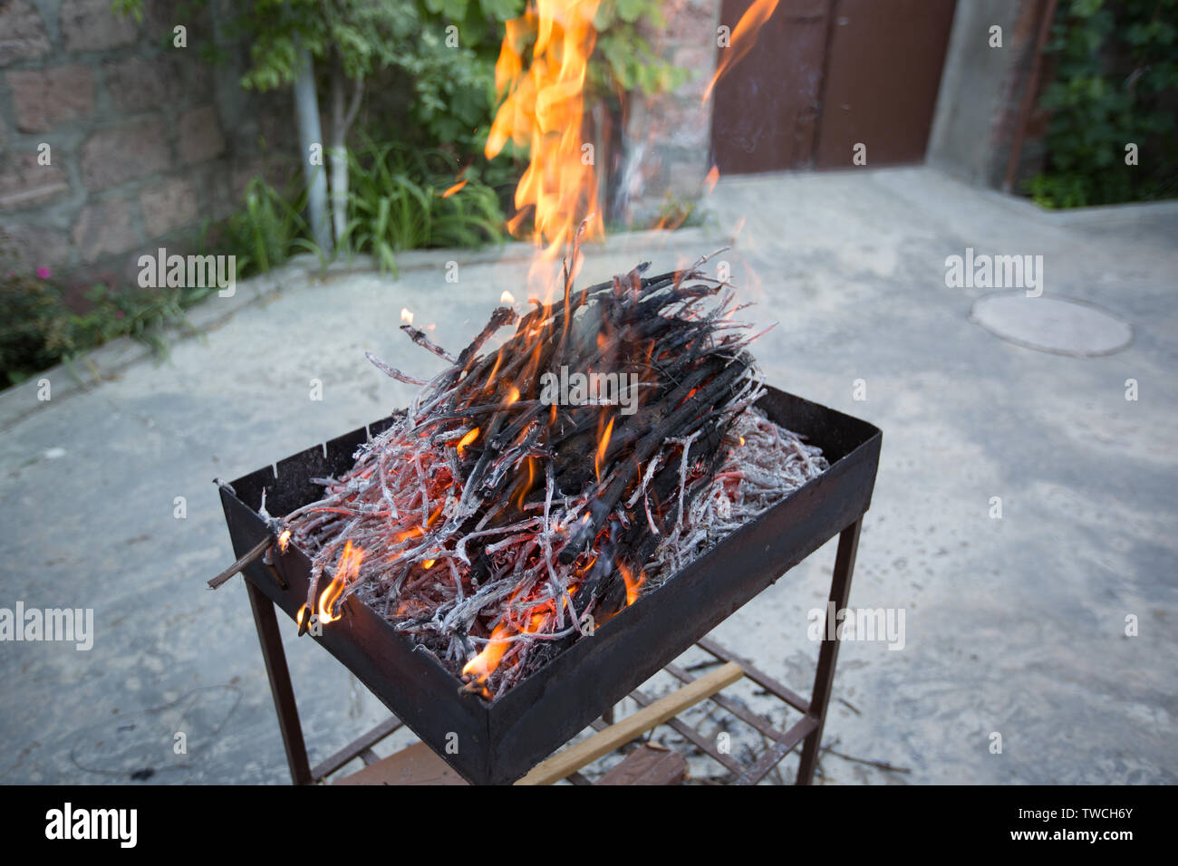 bonfire in the grill in the daytime in summer Stock Photo - Alamy