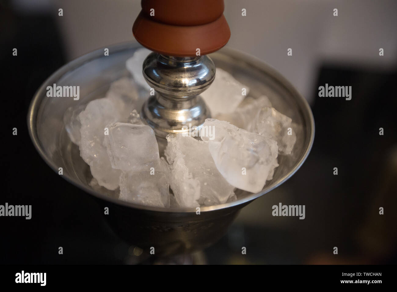 chunks of ice in ice cooler for shisha Stock Photo - Alamy