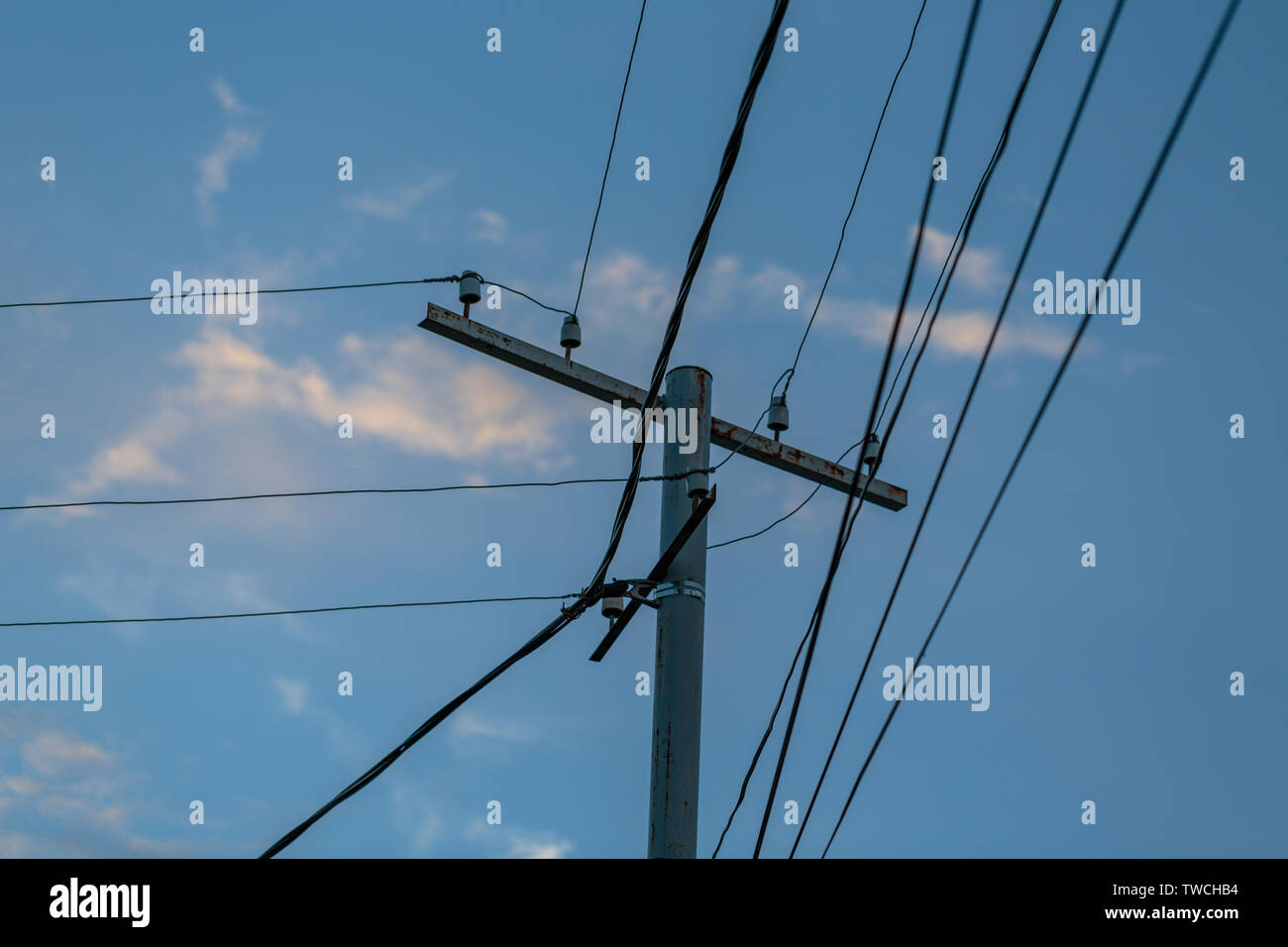 electric guiding support against the blue sky Stock Photo - Alamy